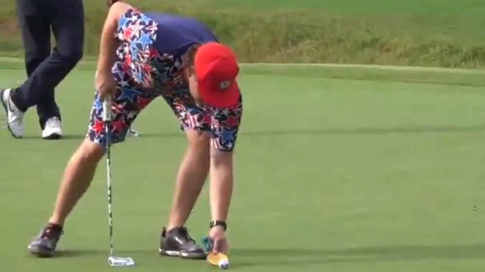 Olympic curling champion uses gold medal to mark ball at Pro-Am: WATCH