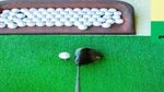 The science of practicing golf off a driving range mat