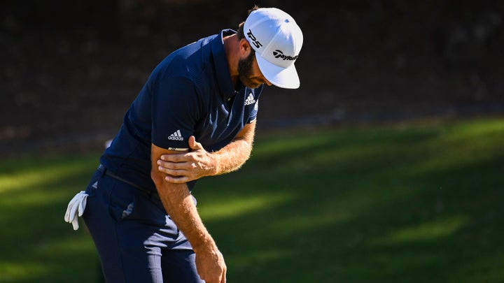 This is why Dustin Johnson holds his arm before he putts