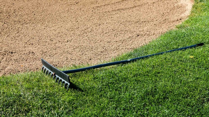 How to use a bunker rake as a training aid to improve your swing