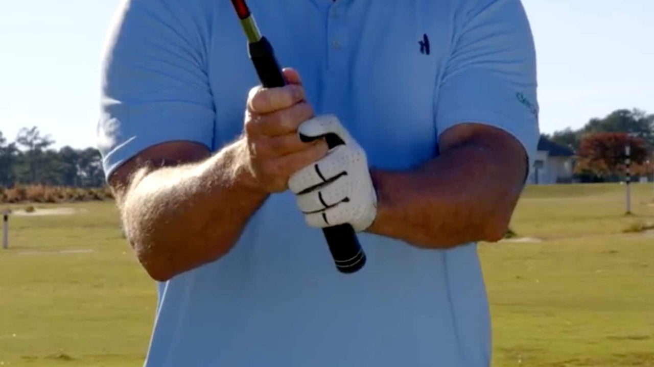 Try this alternative grip if you struggle hitting half-wedge shots