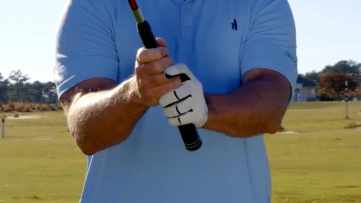 Try this alternative grip if you struggle hitting half-wedge shots