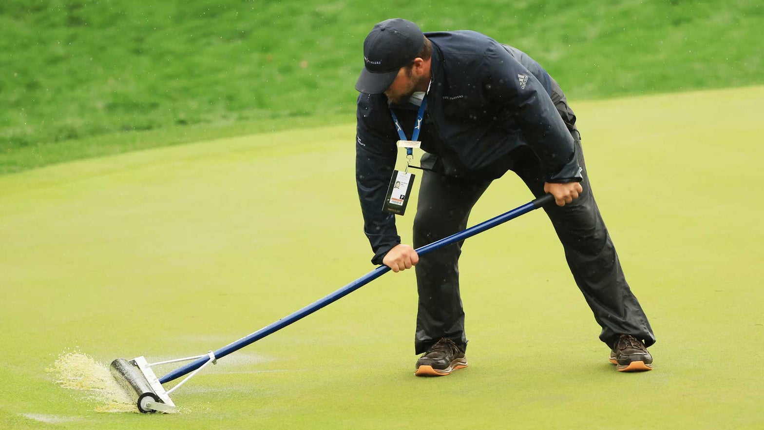 The REAL heroes at TPC Sawgrass? Squeegees.