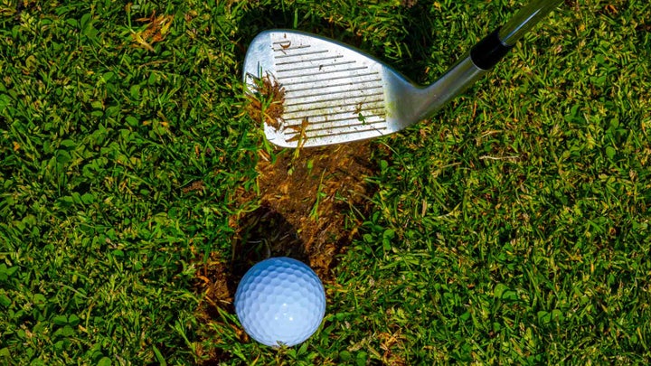 If you mark your ball in the fairway, do you have to replace it in a divot?