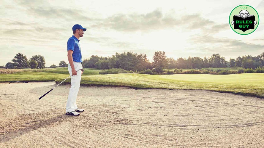 In match play, can you hit a practice shot out of a bunker?