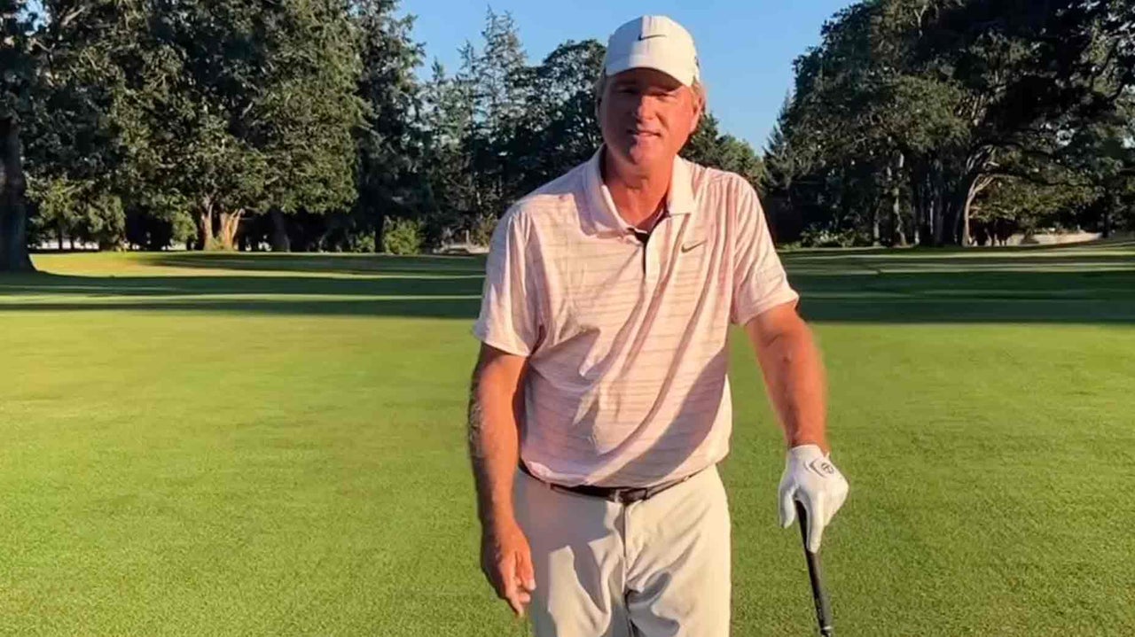 Using a towel can help you hit flush iron shots. Here's how