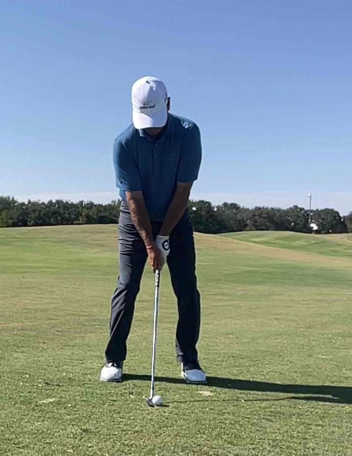 Half-wedge shot into the wind? Do this to strike it like a pro
