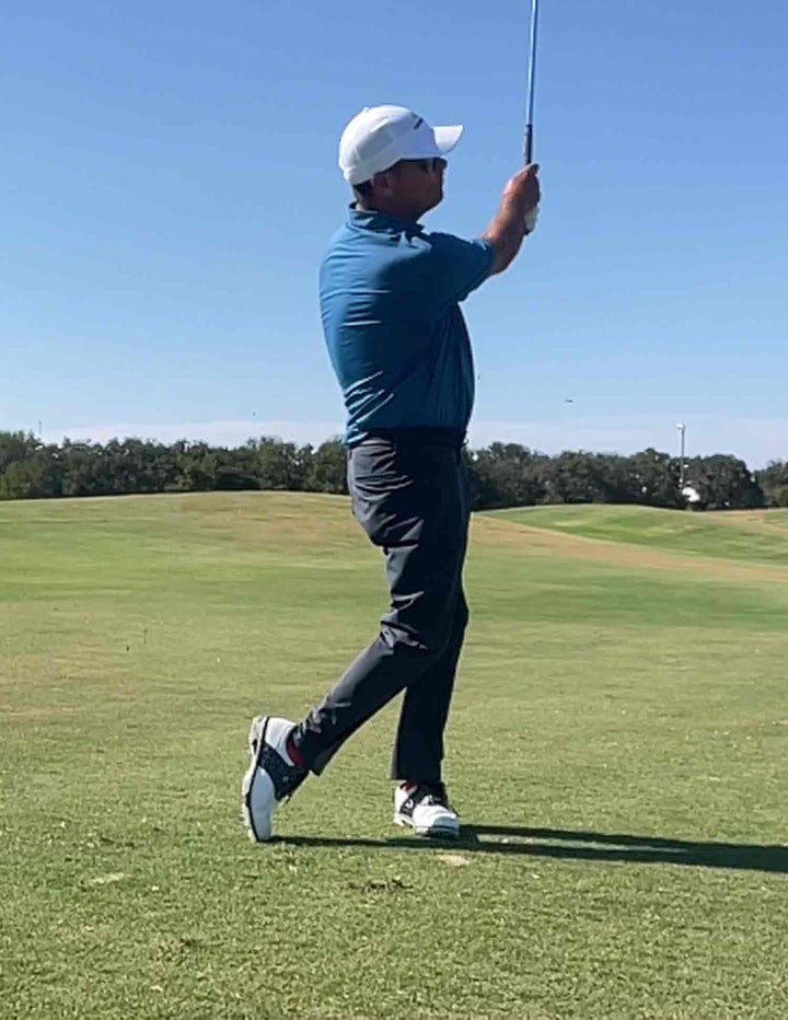 Half-wedge shot into the wind? Do this to strike it like a pro
