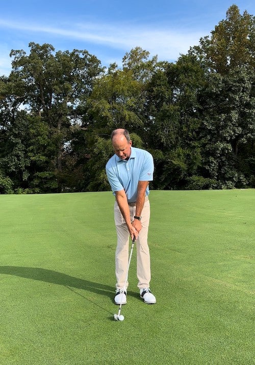 Use this nifty 9-iron shot to get up and down around greens