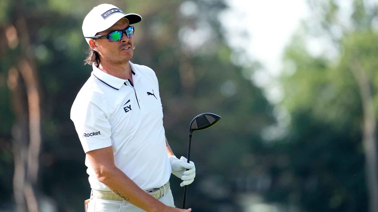 Rickie Fowler at John Deere sign of Signature Event impact
